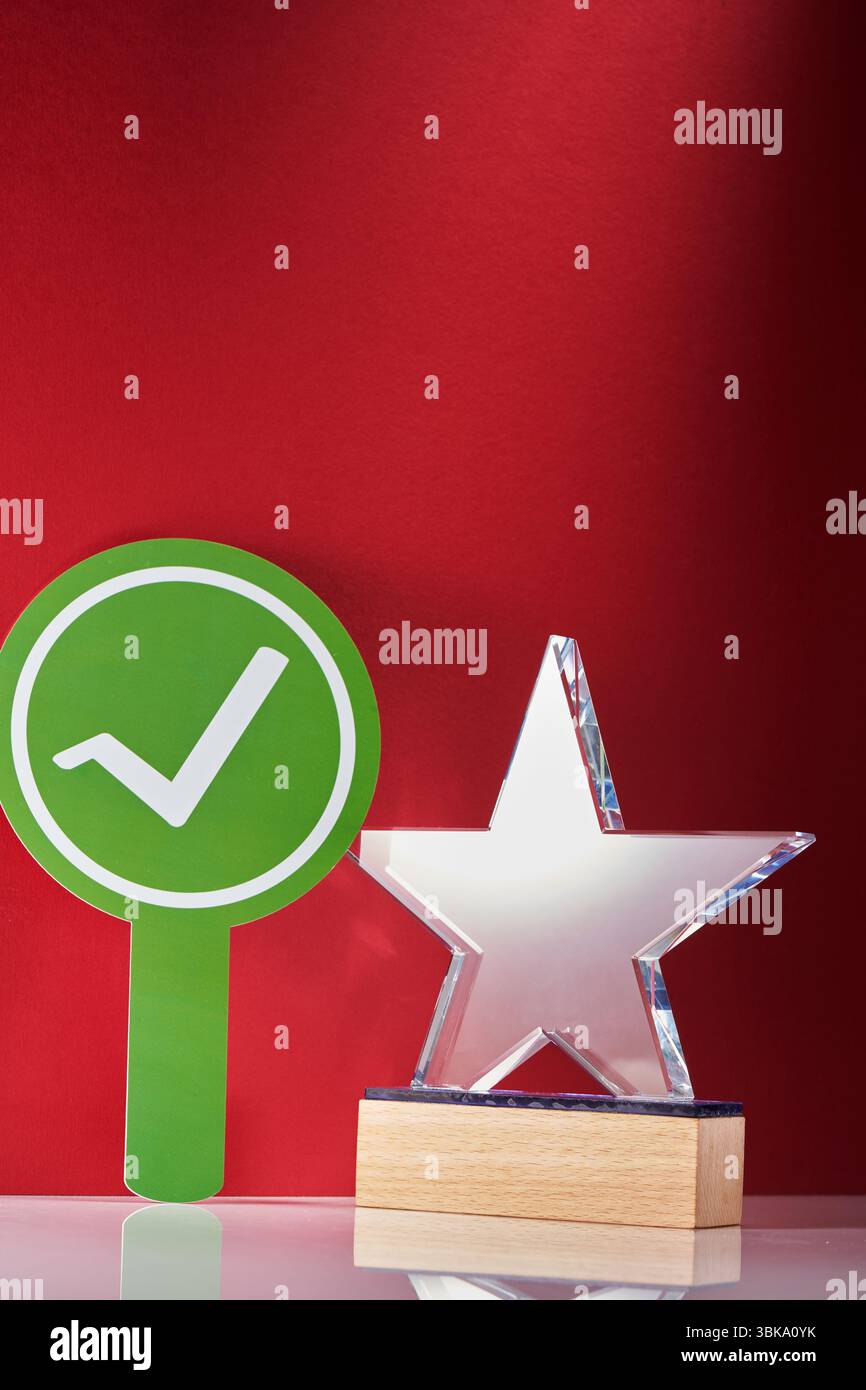 green circle with check mark and crystal trophy Stock Photo - Alamy