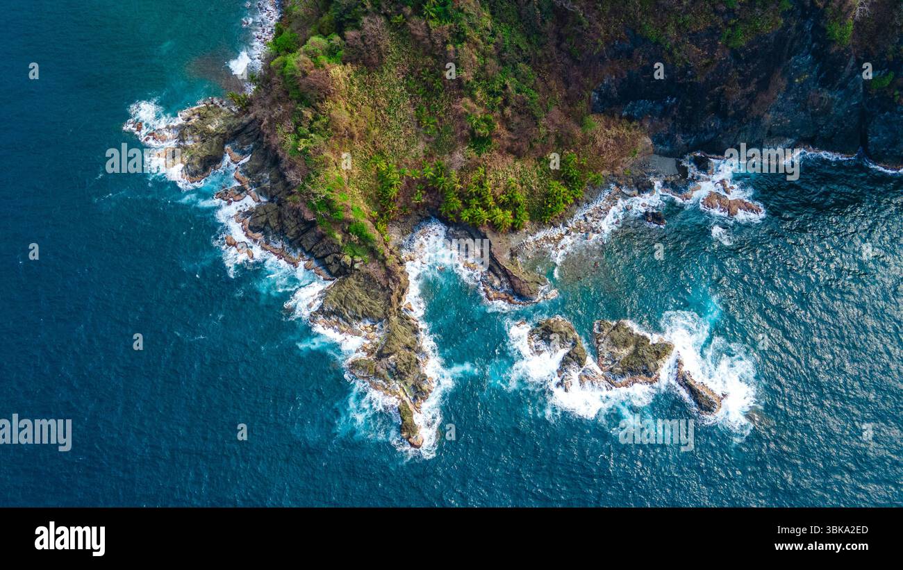 Stunning aerial view of rocky coastline and turquoise waters in ...