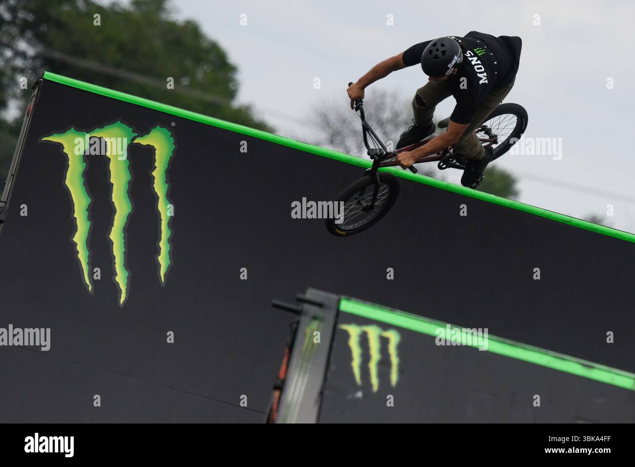 MADISON, IL - JUNE 15: A Monster Energy BMX rider performs before the ...