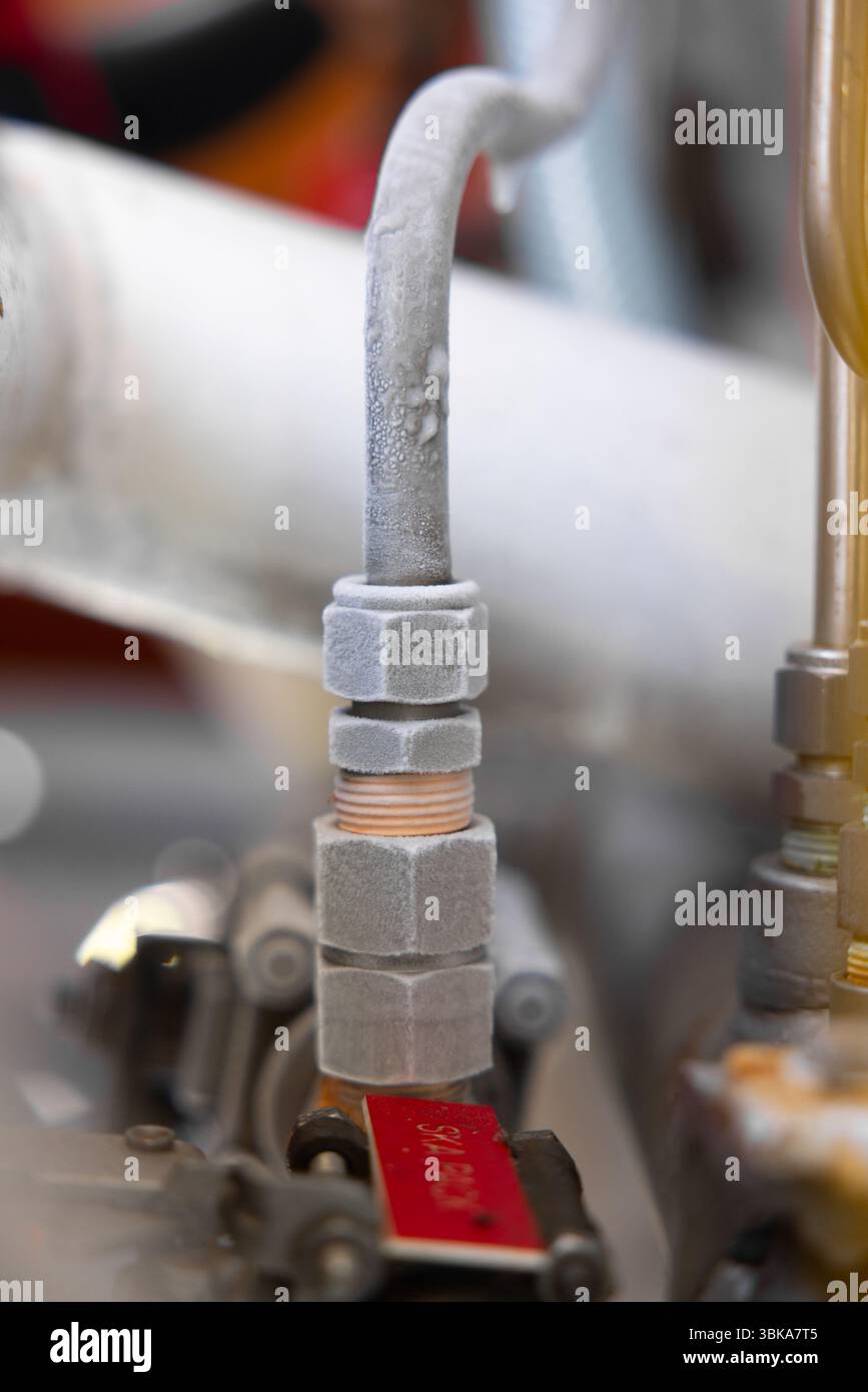 Frost covered pipe under high pressure closeup hi-res stock photography ...