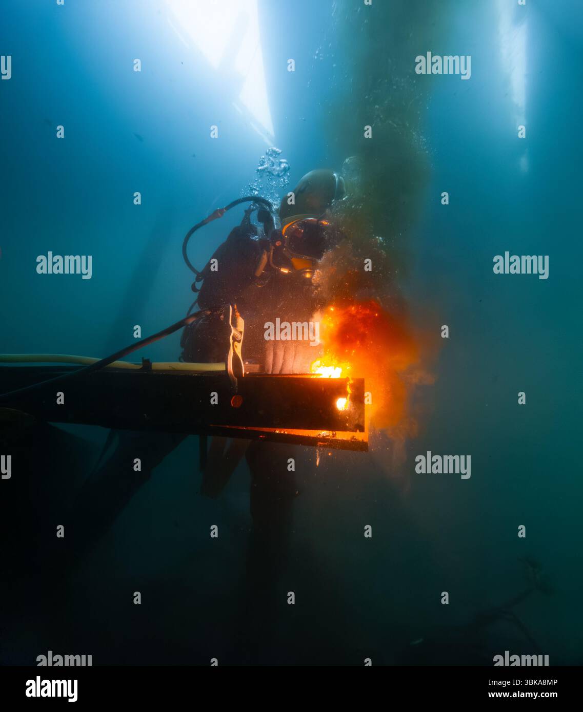 Underwater welding in deep ocean depths closeup Stock Photo - Alamy