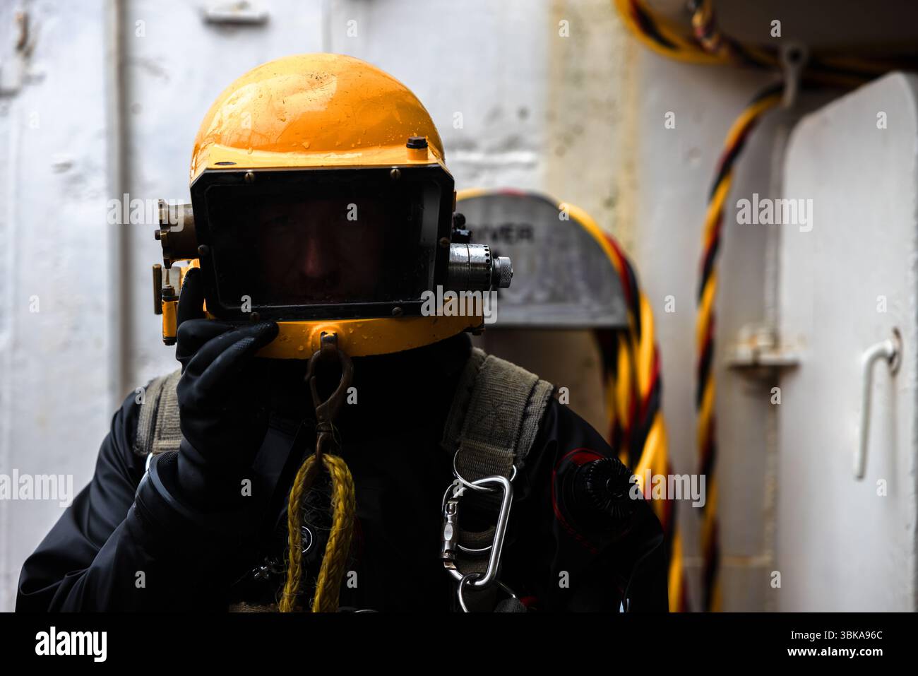 An industrial diver closeup in commercial diving helmet Stock Photo - Alamy