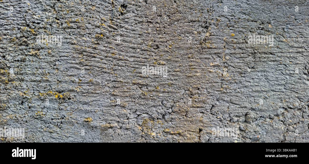 The surface of an old concrete slab. Traces of gray paint on concrete ...