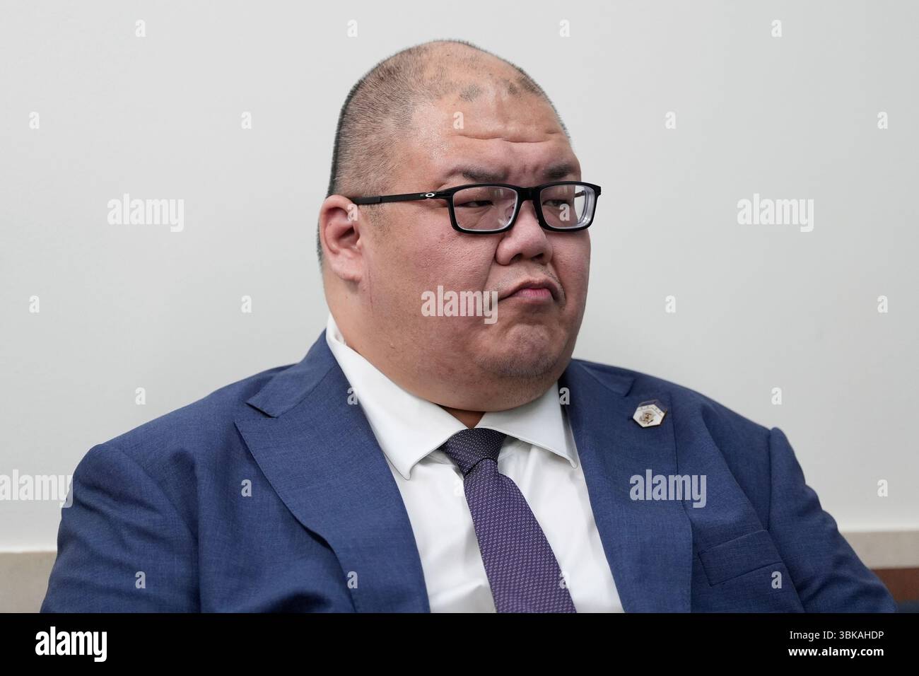 White House communications director Steven Cheung listens during a briefing with reporters in ...