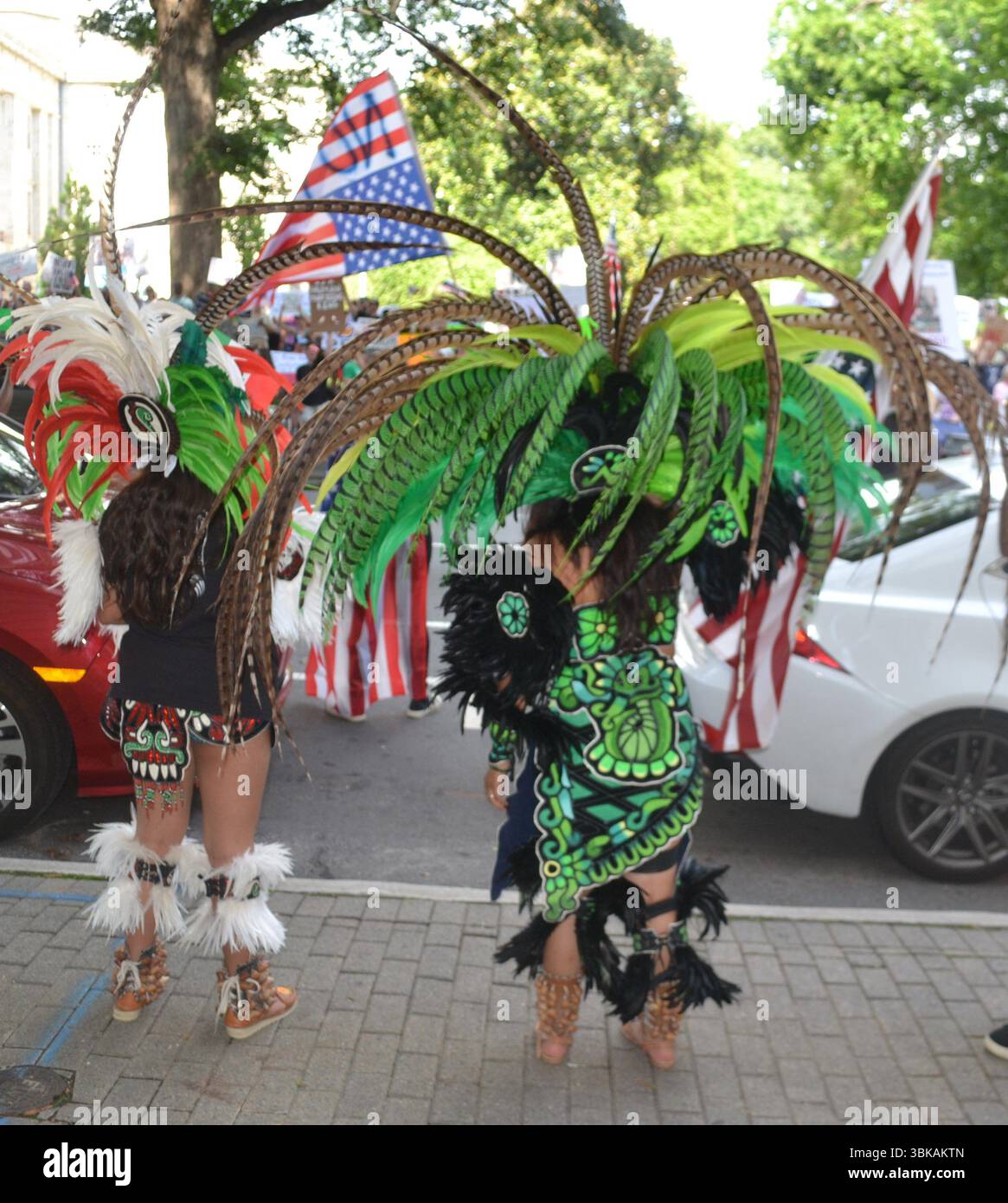 No Kings Rally Protesters in colorful, traditional Aztec dress in ...