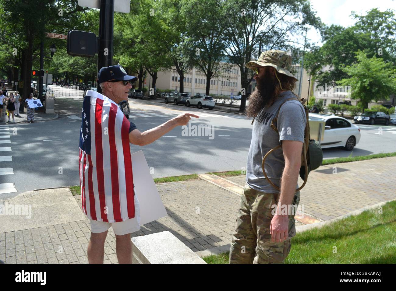 Two men have a debate at the No Kings Rally in Raleigh, NC 2025 Stock ...