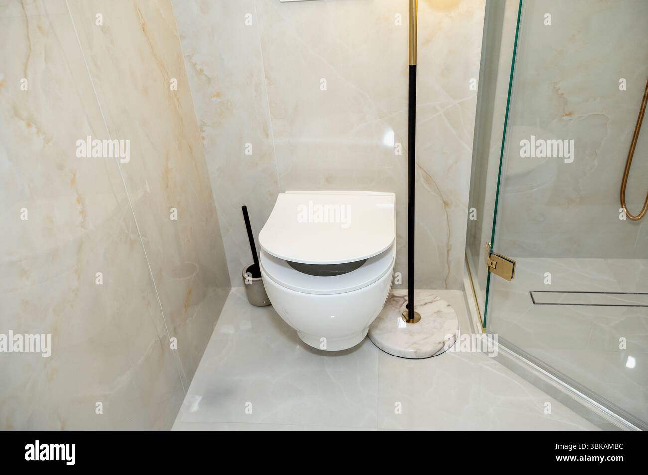 Toilet in the corner of the bathroom. Lid, white, closed, lowered Stock ...