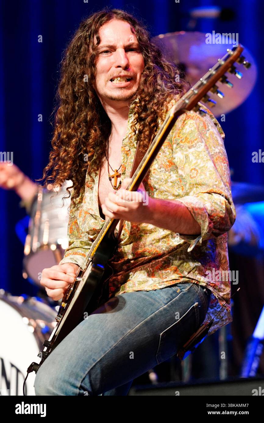 Tyler Armstrong of The Band Feel performs on Wednesday, June 18, 2025 ...