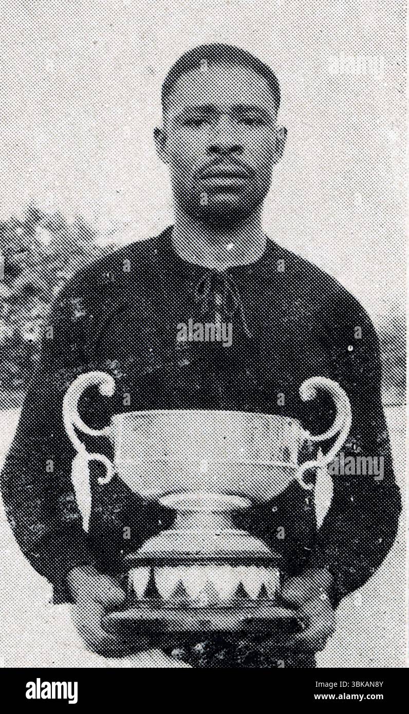 Sgt. Barr Bedel, who won the Tug-of-War at the 1950 Nigeria Police sports event. From a printed ...