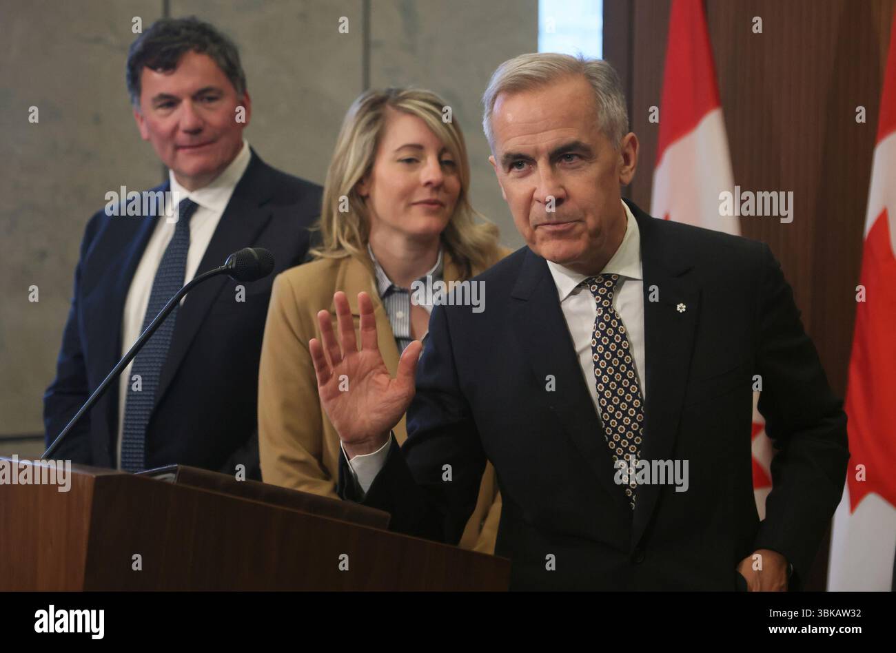Canada Prime Minister Mark Carney leaves a press conference with ...