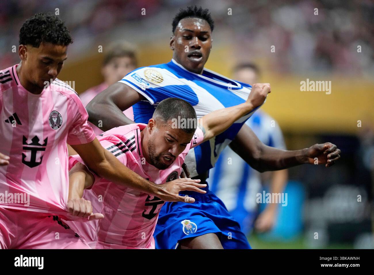 Inter Miami's Marcelo Weigandt, center, and Porto's Samu Aghehowa ...
