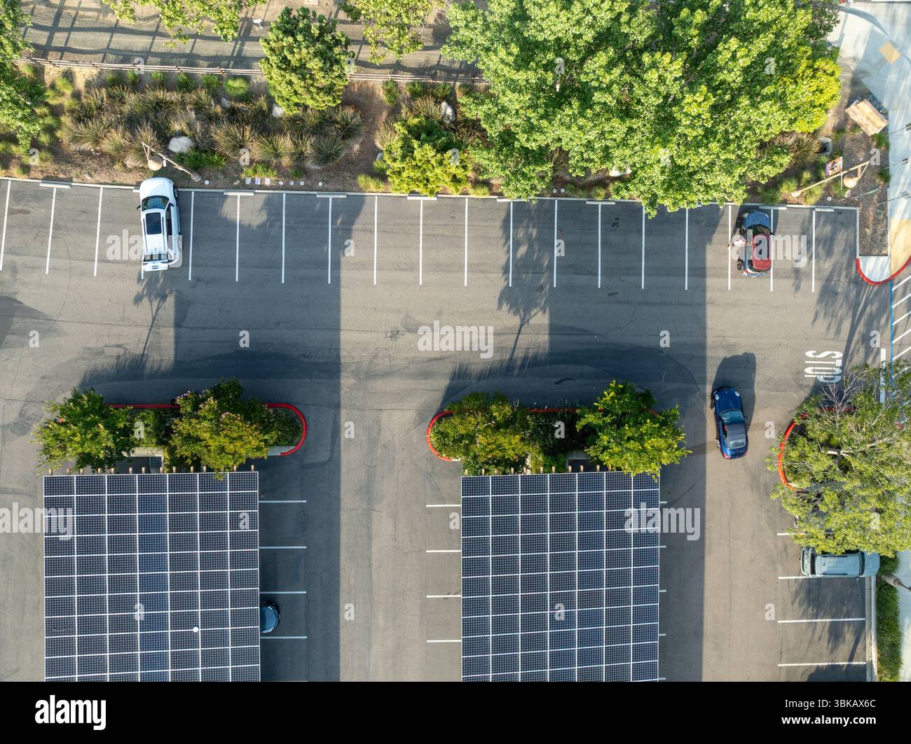 Aerial view of solar panels installed as shade roof over parking lot ...