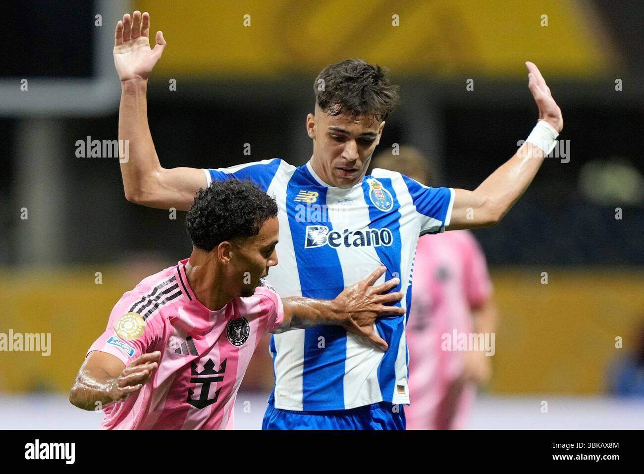 Inter Miami's Ian Fray, left, holds off Porto's Gabri Veiga during the ...