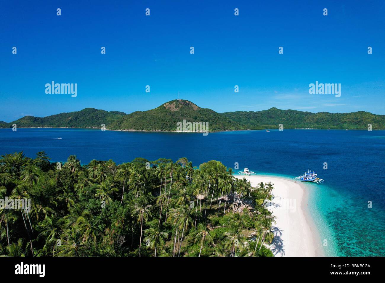 Pink sand beach, turquoise water, remote island — Aerial view of a ...