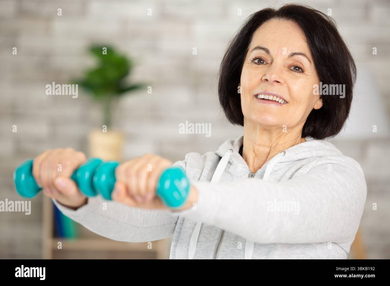 mature woman doing flexibility exercises Stock Photo - Alamy