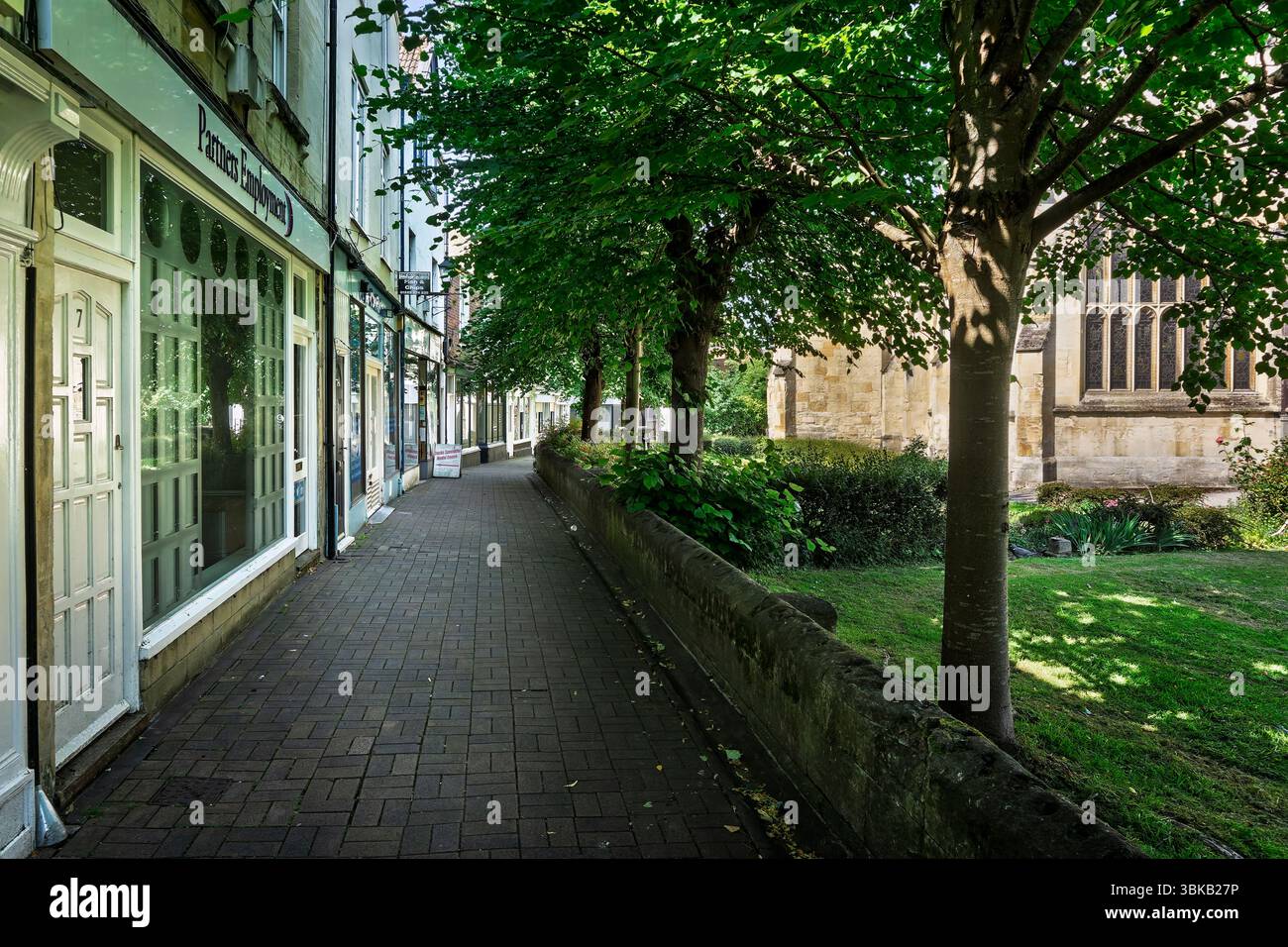 Narrow tree lined pathway connecting Fore Street and Church street ...