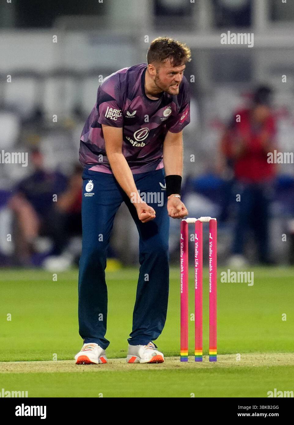 Middlesex's Tom Helm celebrates their win over Essex during the ...