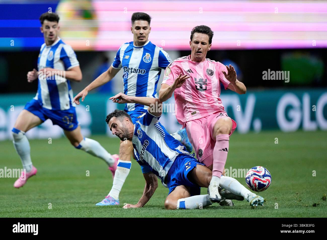 Inter Miami's Tadeo Allende, right, is challenged by Porto's Martim ...