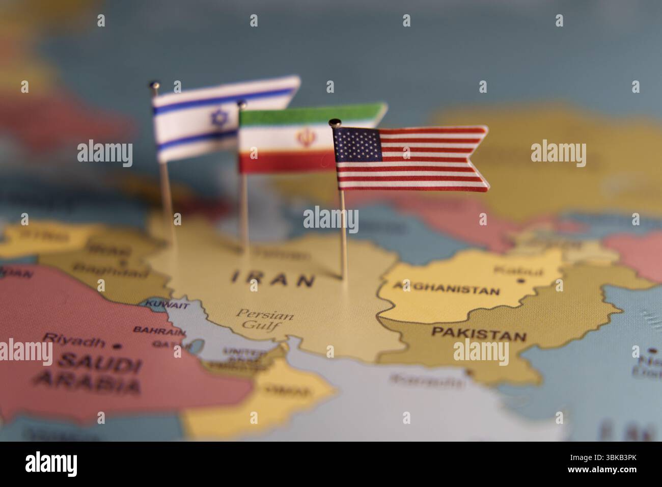 Flags of Israel, Iran, and USA pinned on map showing geopolitical ...