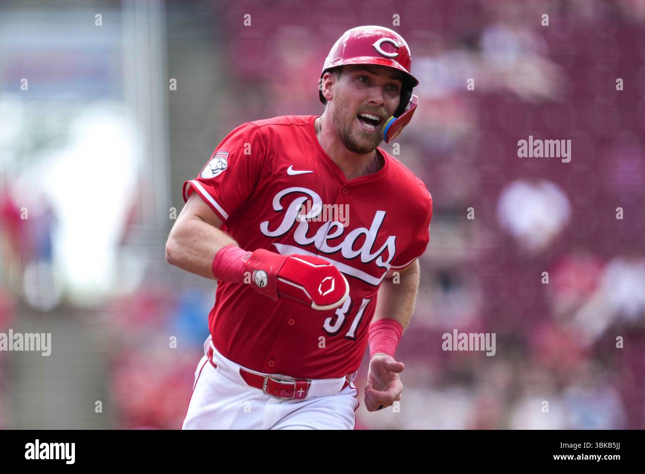 Cincinnati Reds' Tyler Stephenson rounds the bases after teammate ...