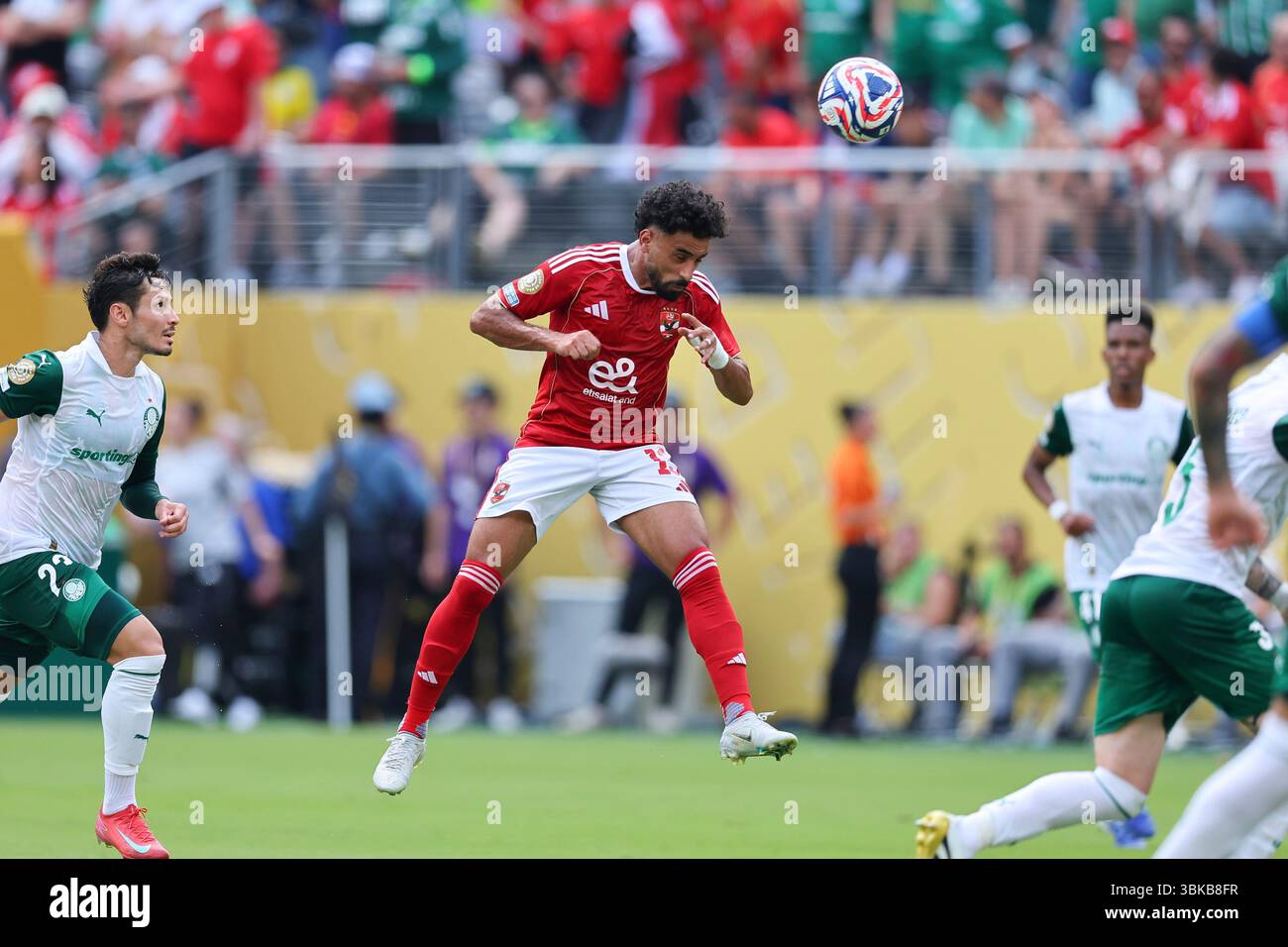 EAST RUTHERFORD, NJ - JUNE 19: Marwan Attia #13 of Al Ahly heads the ...