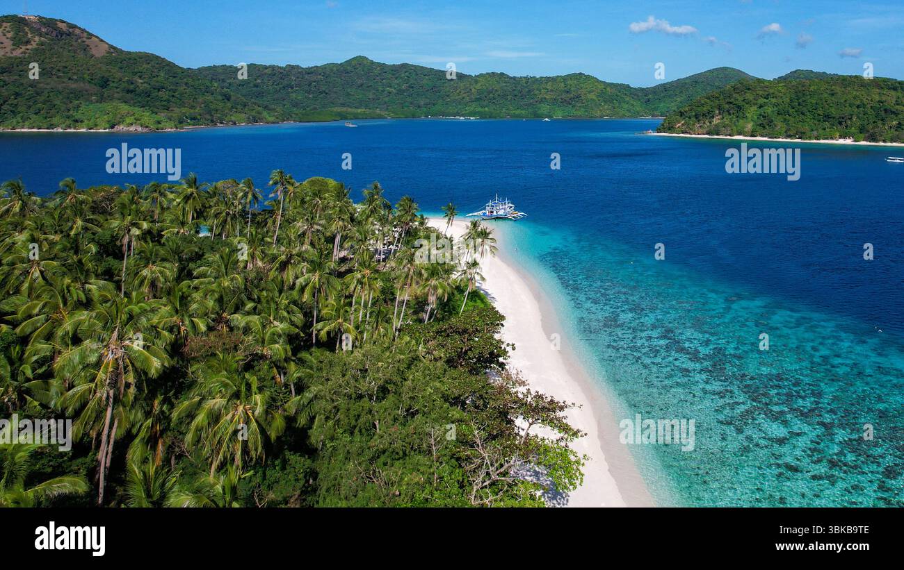 Pink sand beach, turquoise water, remote island — Aerial view of a ...