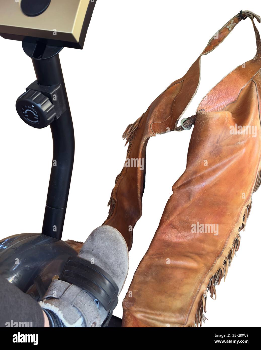 Western cowboy chaps are worn over legs when riding a horse. Image ...