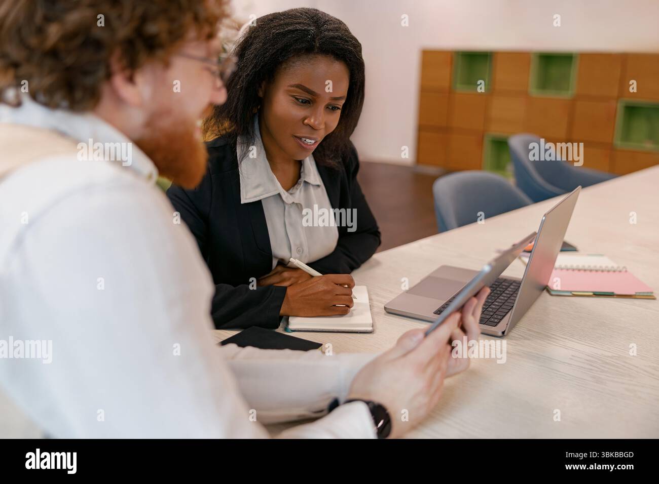 Participating in a Collaborative Business Meeting within a Modern and ...