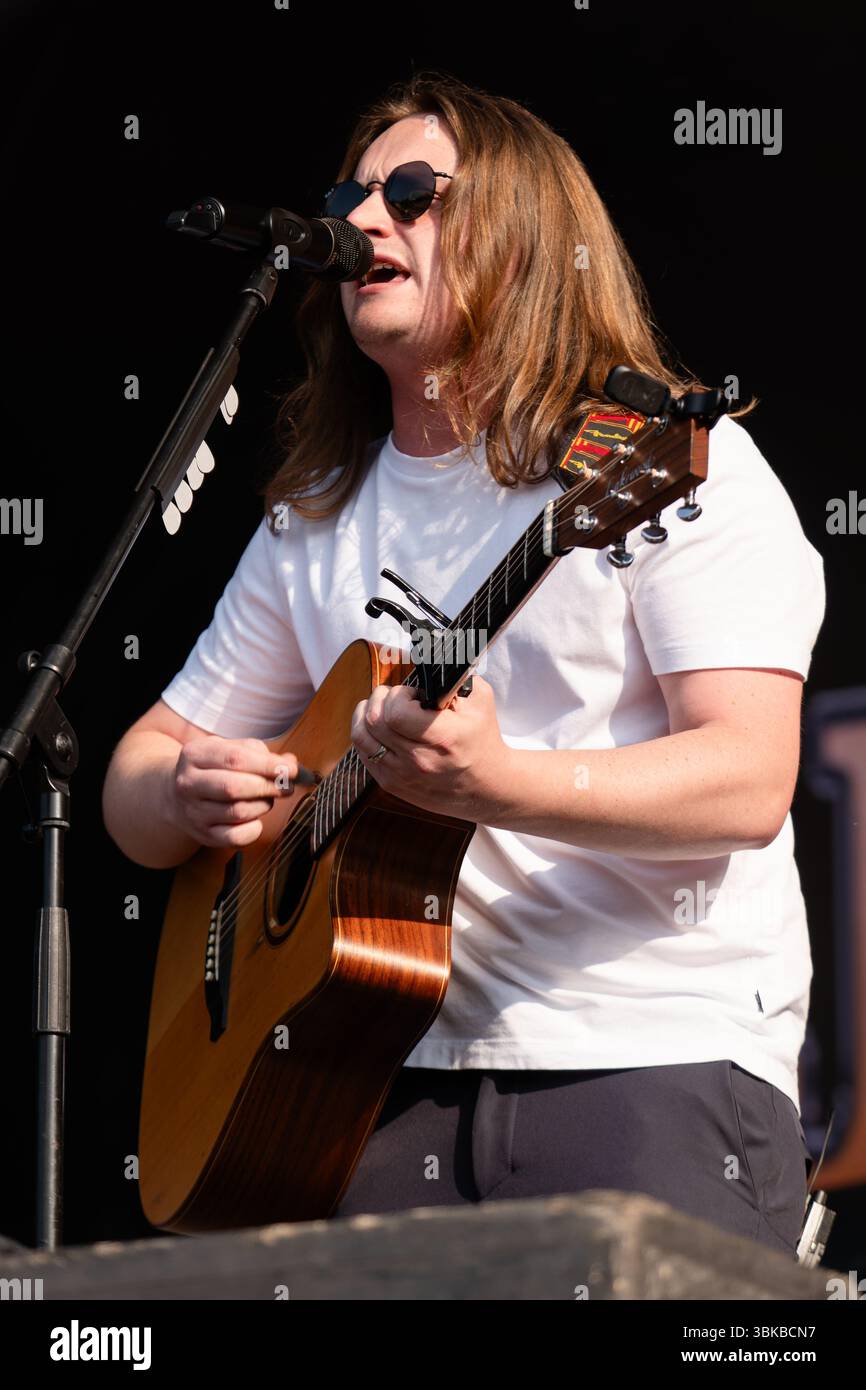 Thetford, UK, 19 June, 2025. Jamie Webster supporting James in concert ...