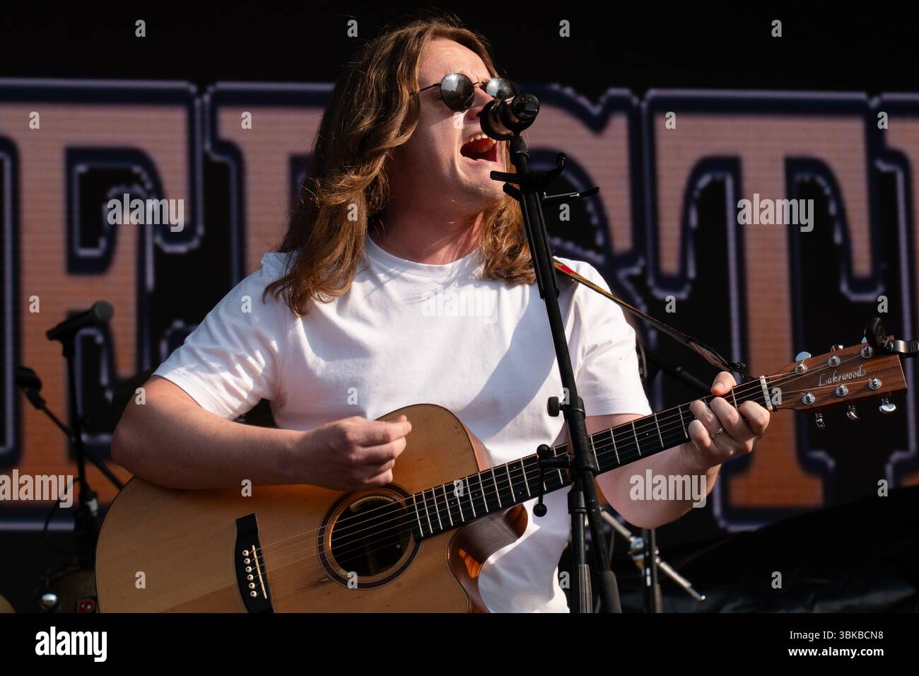 Thetford, UK, 19 June, 2025. Jamie Webster supporting James in concert ...