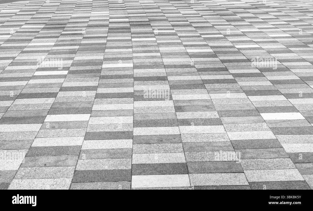 Stone tile pavement. Paving slabs or stone. Tiled sidewalk. Sidewalk ...