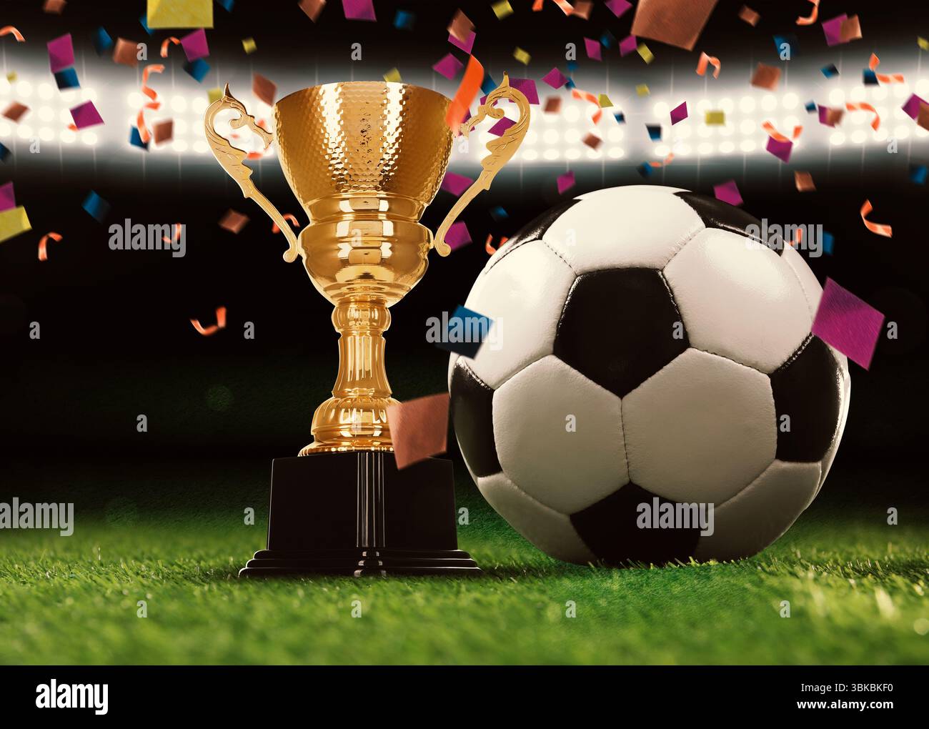 Football championship. Shiny golden trophy cup and soccer ball under ...