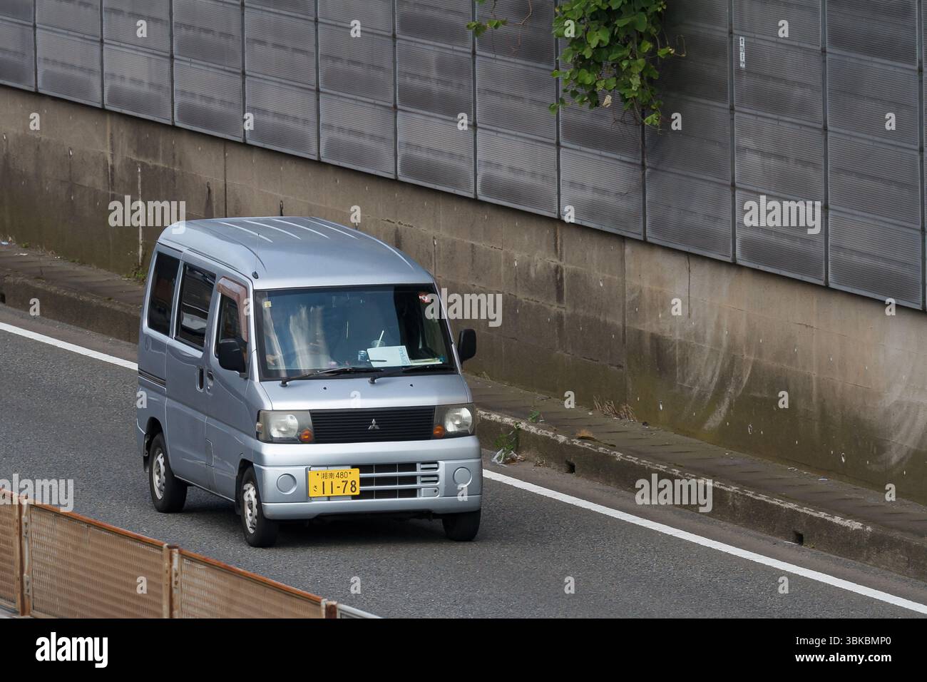 A Mitsubishi Minicab microvan on a road in Kanagawa, Japan Stock Photo ...