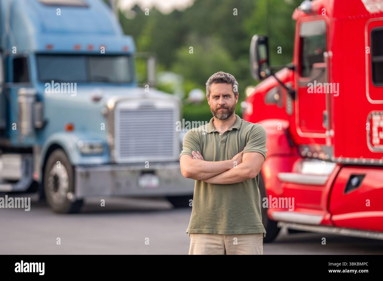 Trucking owner. Truck driver. Man trucker driver near lorry truck ...