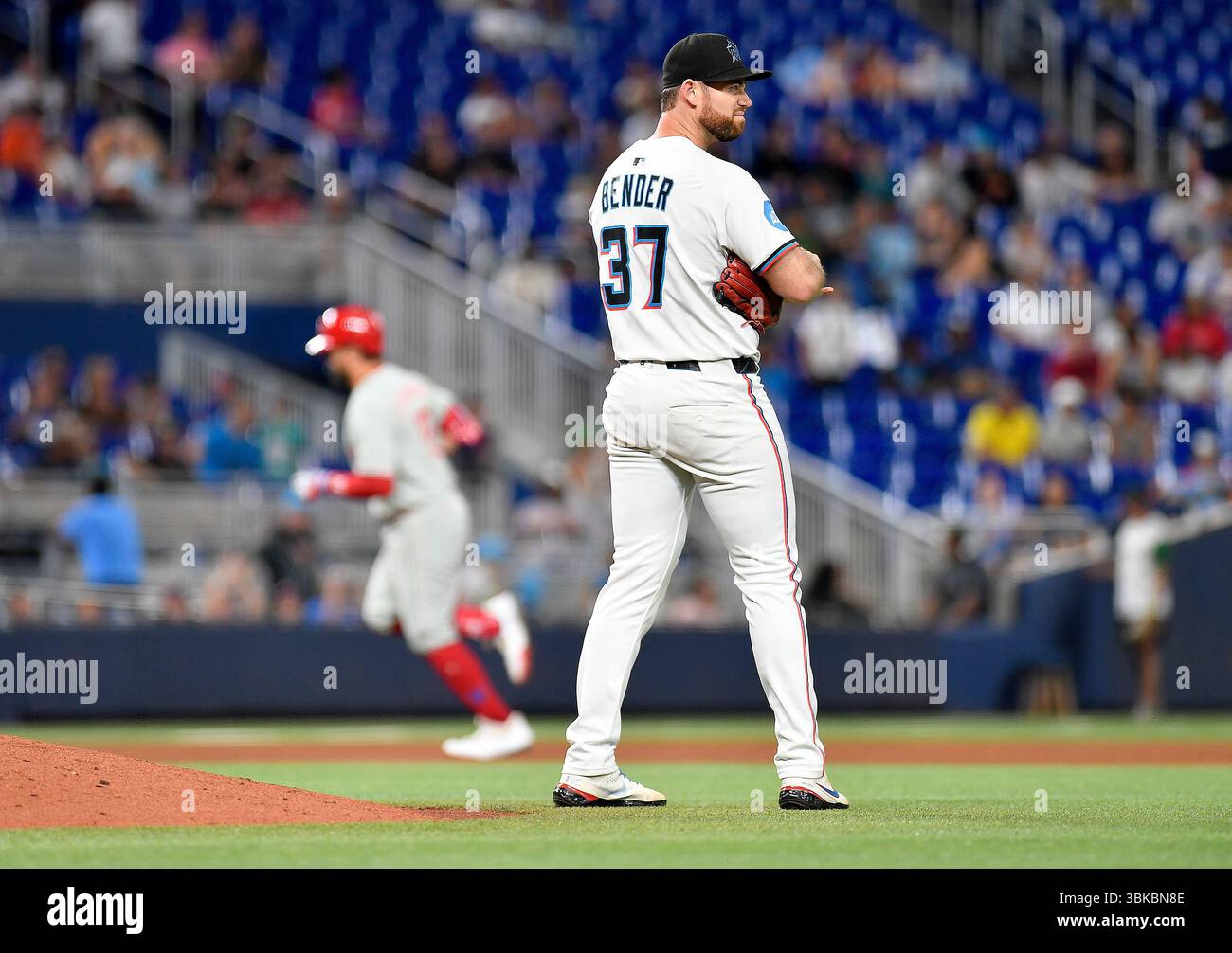Miami Marlins pitcher Anthony Bender (37) reacts after giving up a home ...