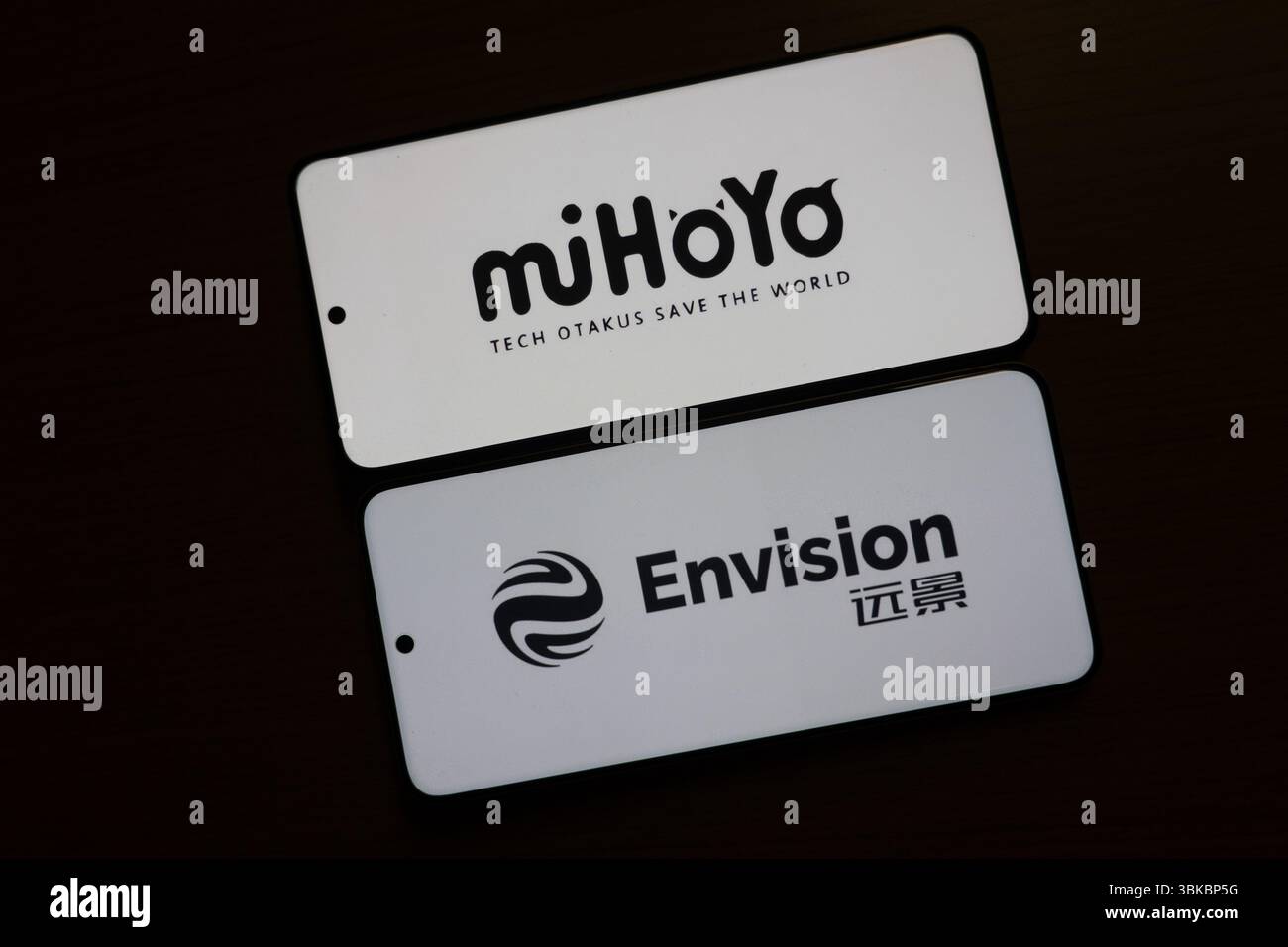 SHANGHAI, CHINA - JUNE 20, 2025 - The corporate logos of MiHoYo and Envision displayed on a ...