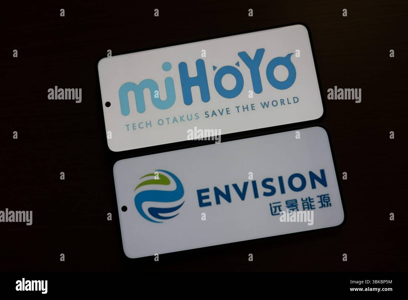 SHANGHAI, CHINA - JUNE 20, 2025 - The corporate logos of MiHoYo and Envision displayed on a ...