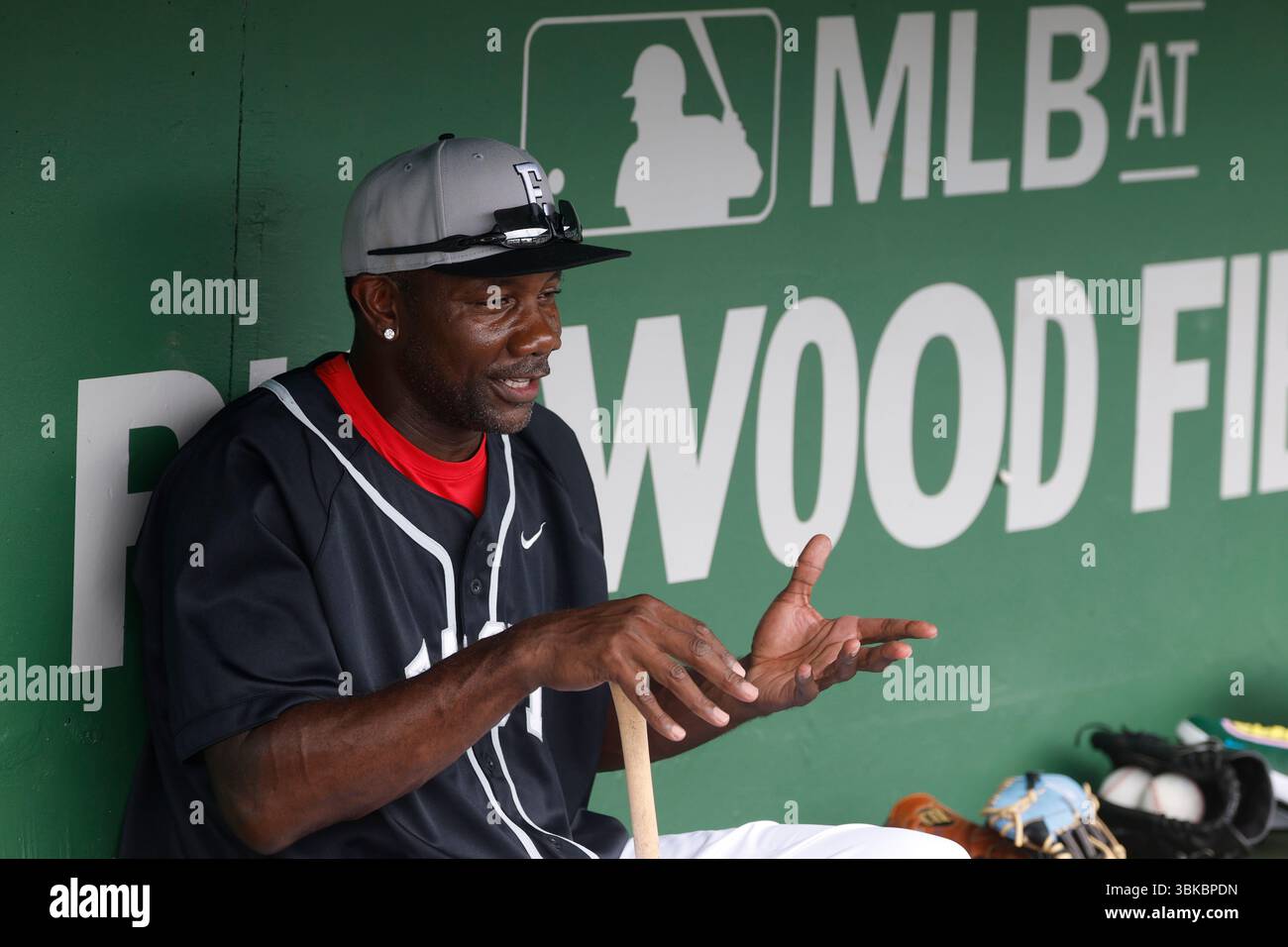 Team East's Ryan Howard sits in the dugout before the East West Classic ...