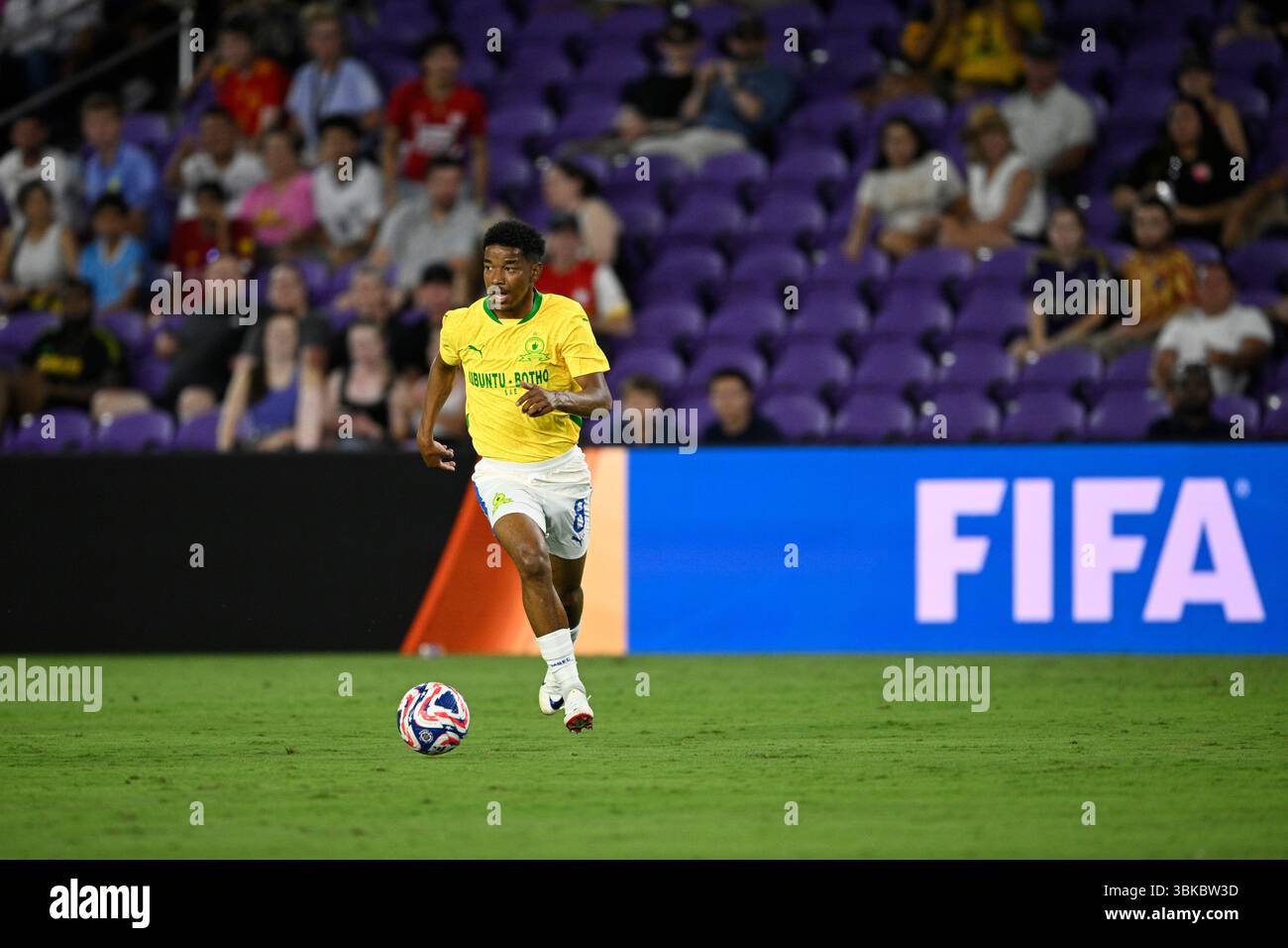 Mamelodi Sundowns' Jayden Adams (8) controls the ball during a Club ...