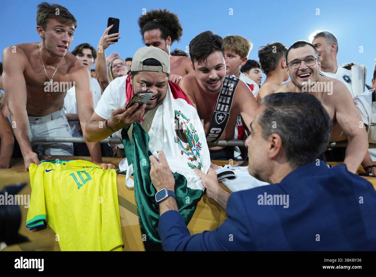 Botafogo manager Renato Paiva signs autographs for fans after winning ...