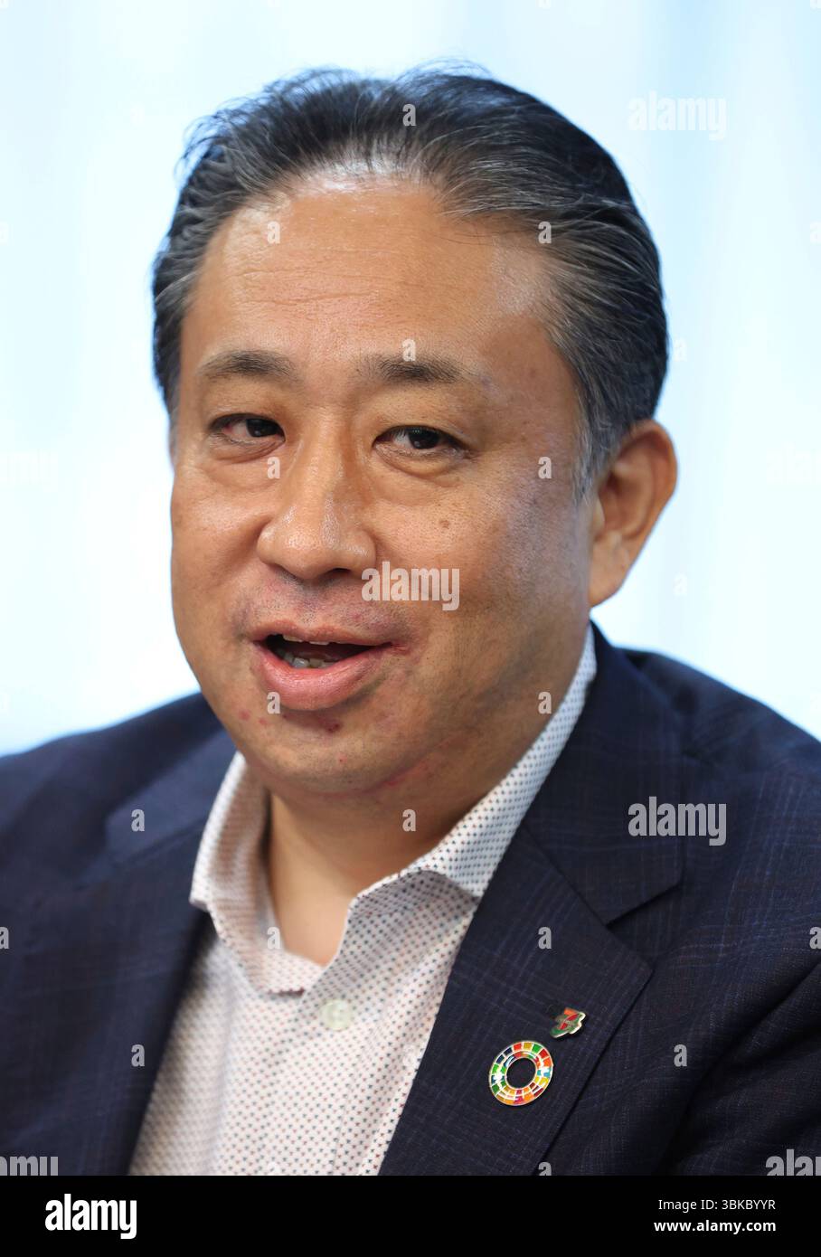 Seven-Eleven Japan President Tomohiro Akutsu responds to an interview ...