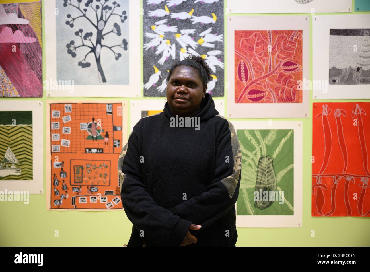 Artist Bitharr Maymuru poses for a photograph with her artwork at the ...