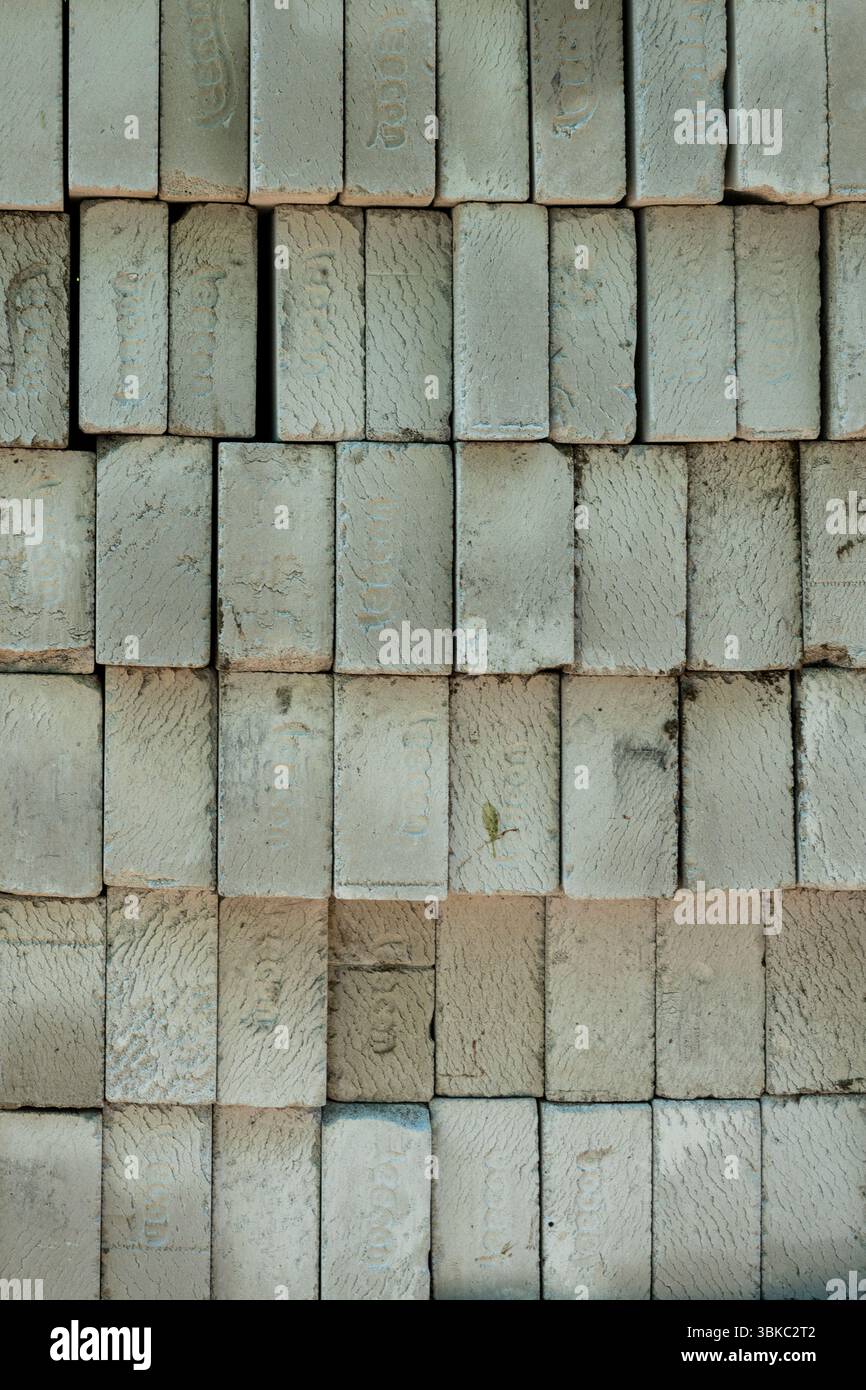 Wall made of white bricks. The bricks are stacked in a pattern. The ...