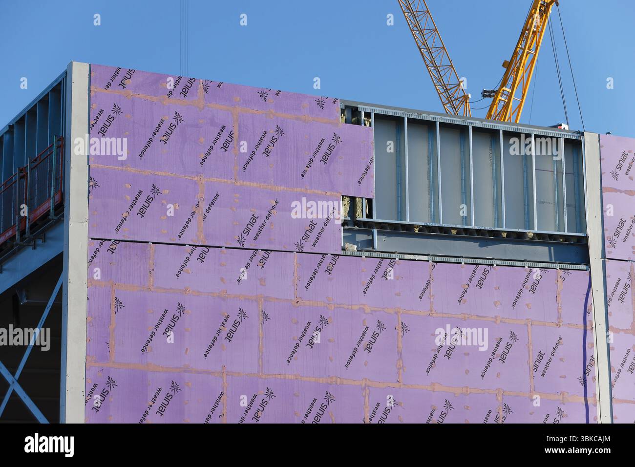 Steel skeleton frame with secondary steelwork, cross brace and weather ...