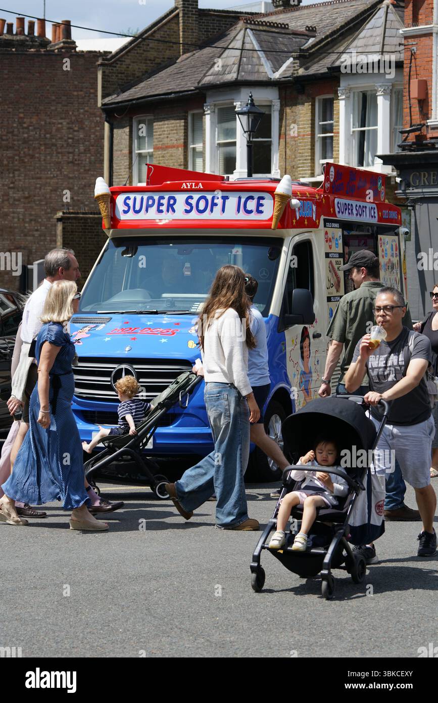 Crowd Enjoying Ice Cream Near Colorful Street Vendor Truck in Urban ...