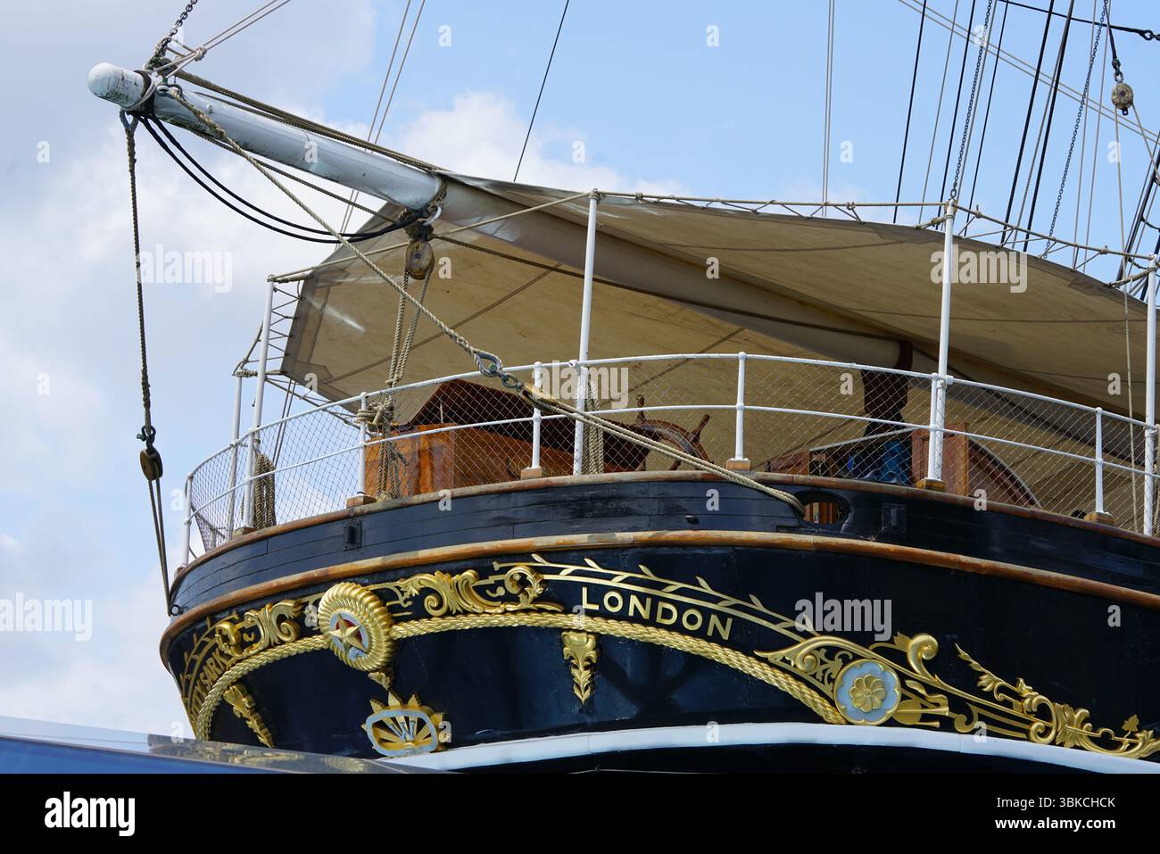 Historic Sailing Ship with Decorative Details and Steering Wheel in ...