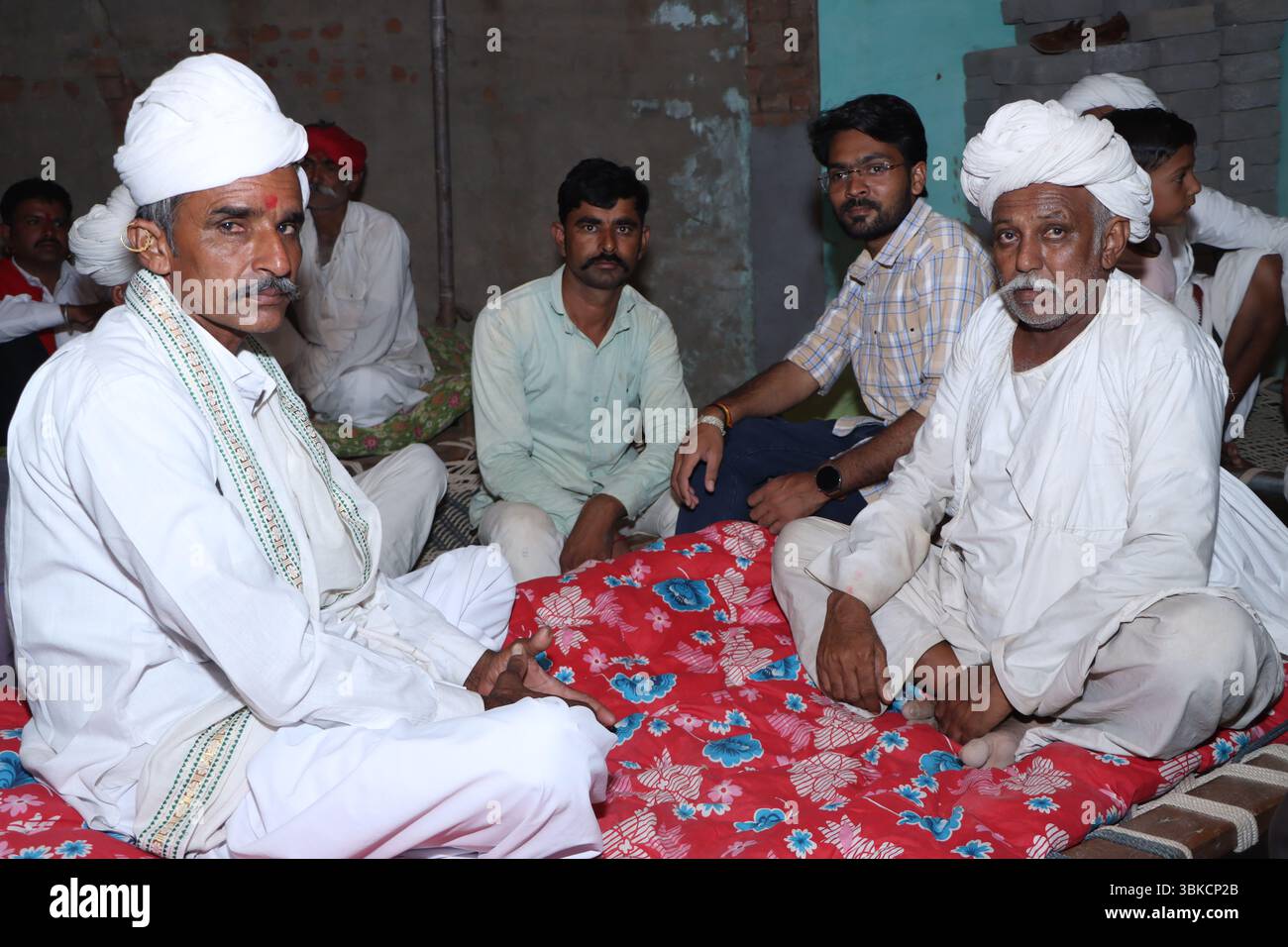 Two Elderly Men Sitting on a Traditional Cot in Rural India Stock Photo ...