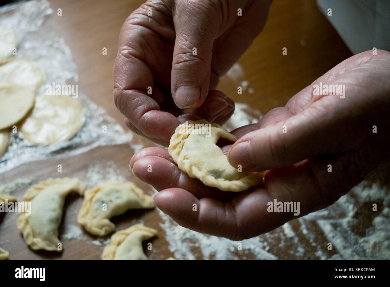 Close up hands forming dough hi-res stock photography and images - Alamy