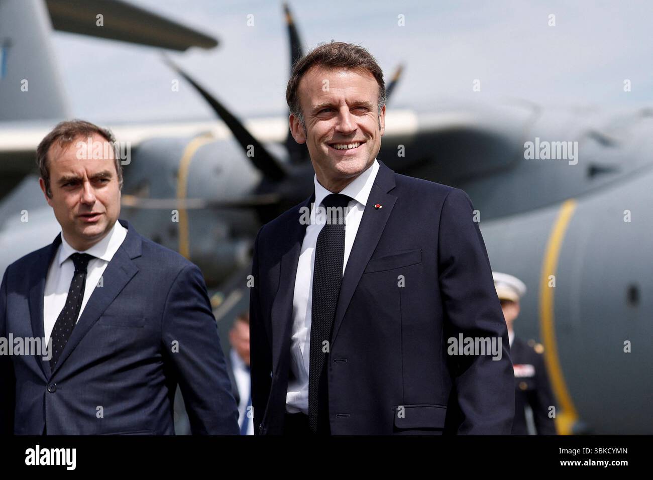 French President Emmanuel Macron arrives welcomed by French Defense Minister Sebastien Lecornu ...
