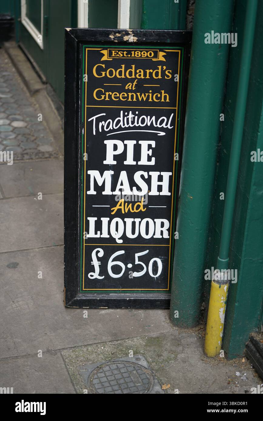 Chalkboard Sign Advertising Traditional Pie Mash And Liquor Outside ...